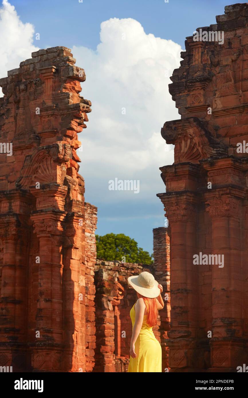 A girl with a hat inside the San Ignacio Mini Ruins, Misiones ...