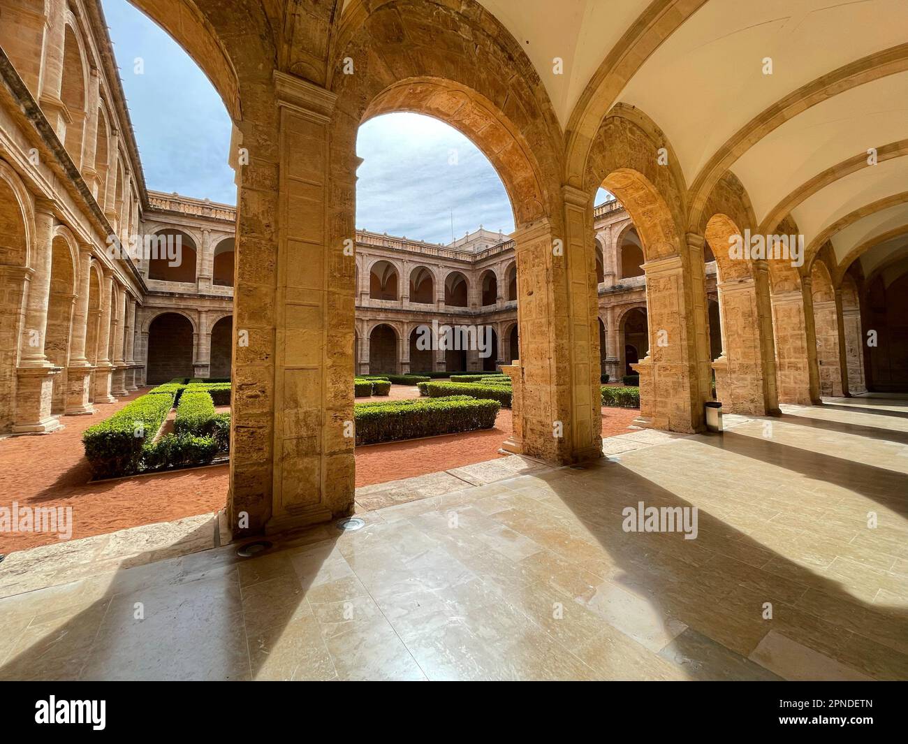 The beautiful courtyard and arches of Monasterio de San Miguel de los ...