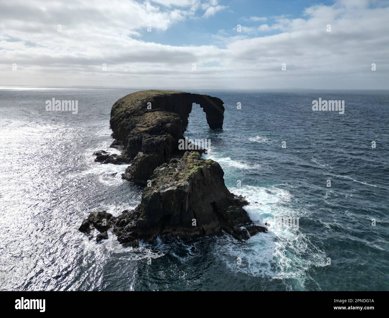 A breathtaking view of rock formation in the middle of the ocean Stock ...