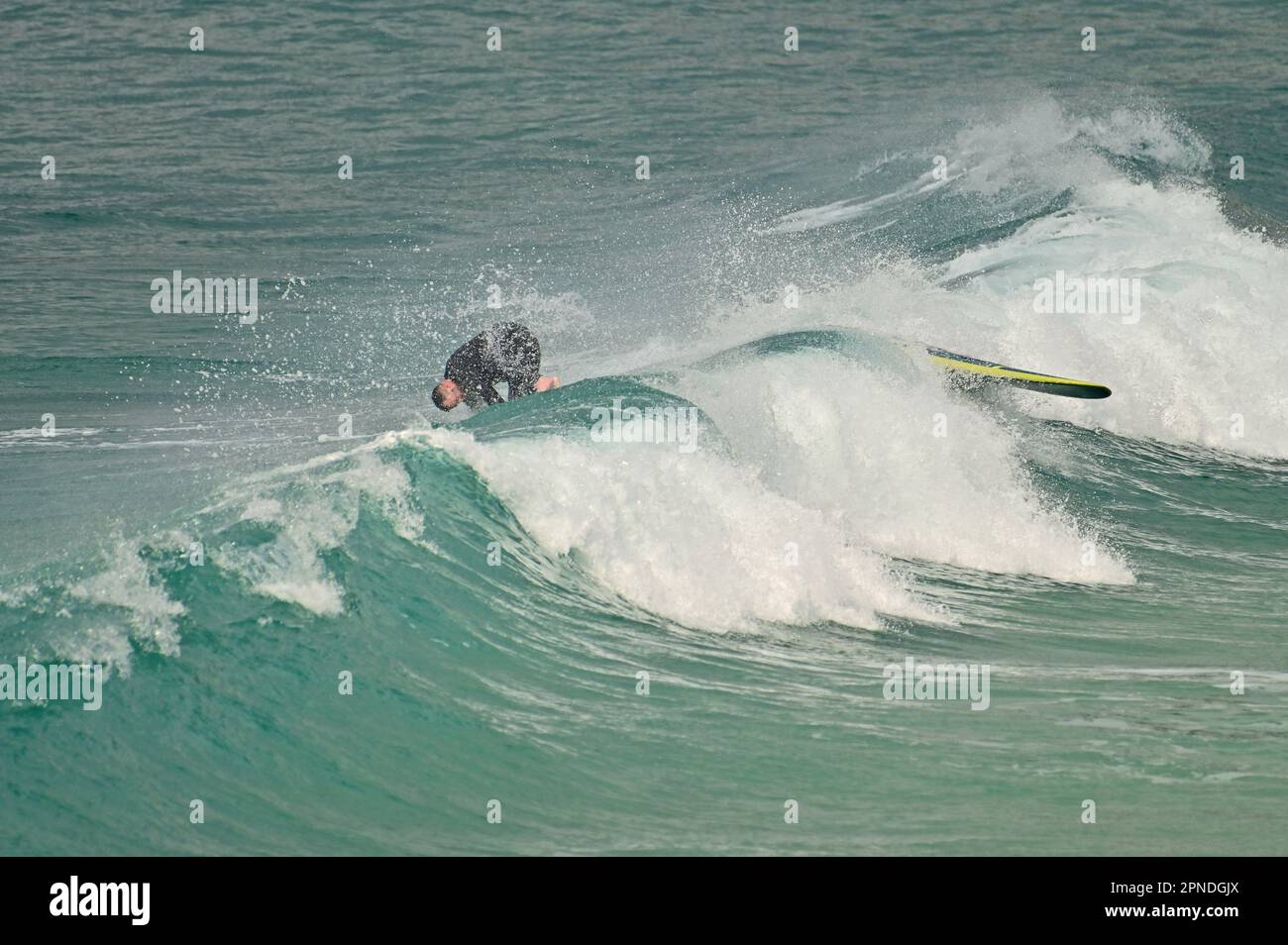 Surfer riding on rolling wave hi-res stock photography and images - Alamy