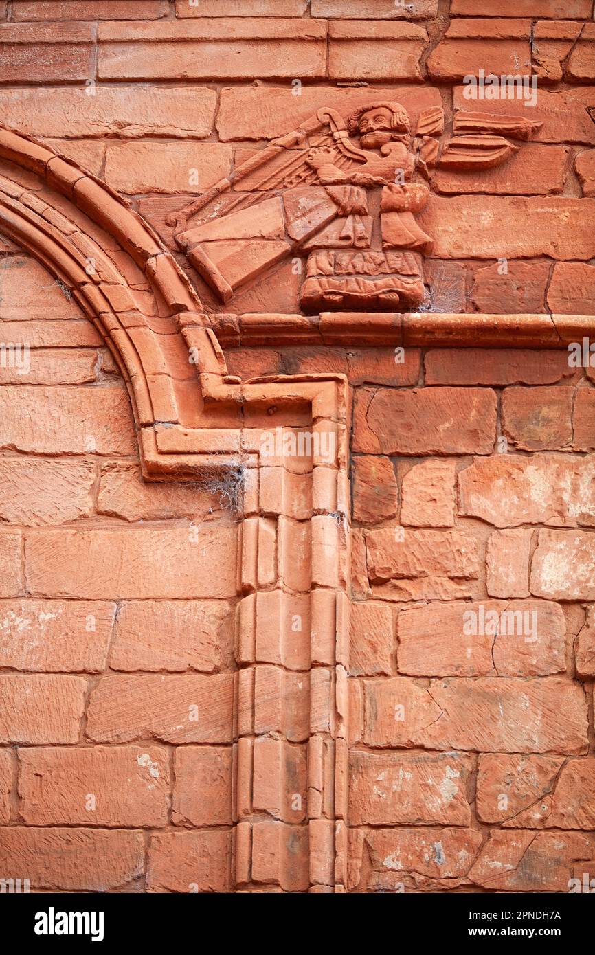 Detail of an angel playing the harp on a wall inside the Jesuit ...