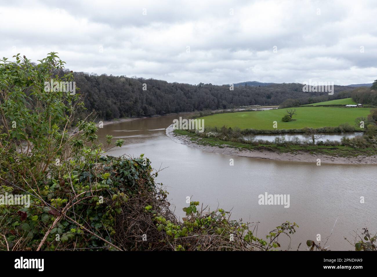 Chepstow, UK. 14th April, 2023. A bend in the River Wye is viewed from ...