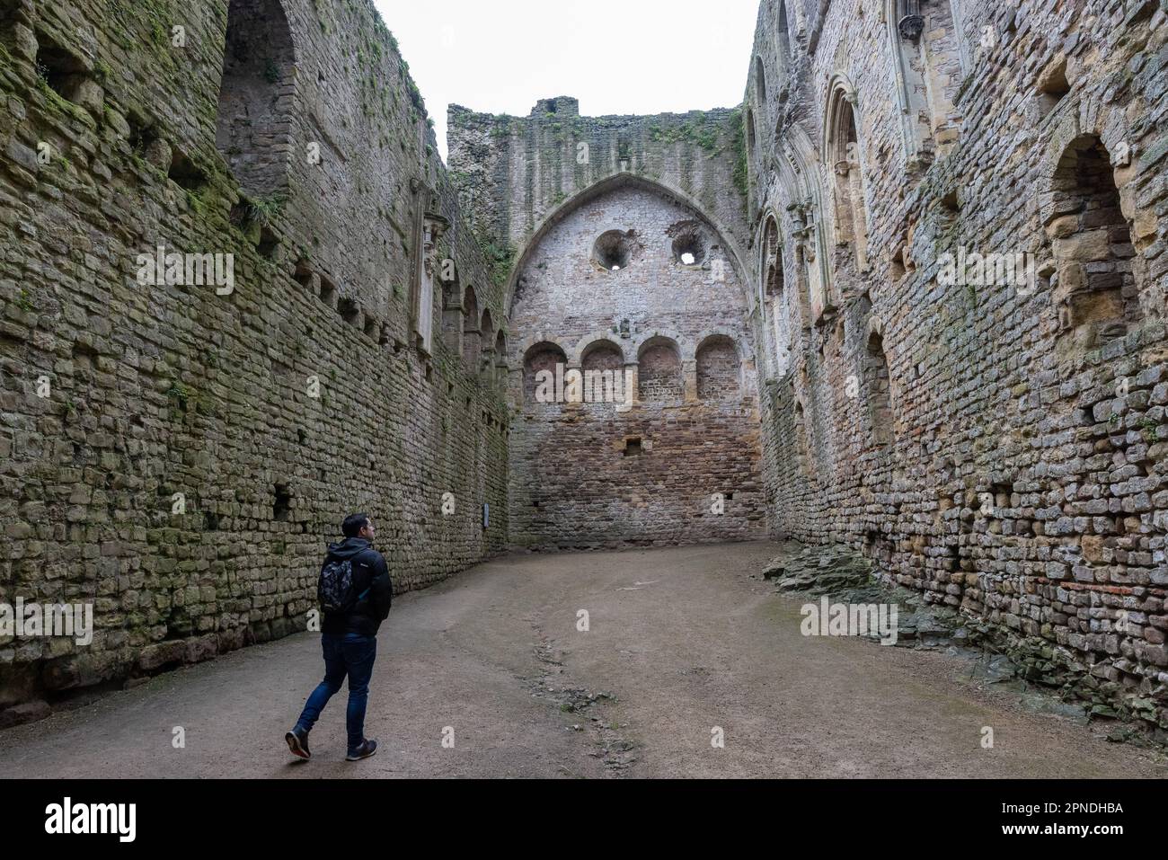 Chepstow, UK. 14th April, 2023. A man walks through the Great Tower of ...