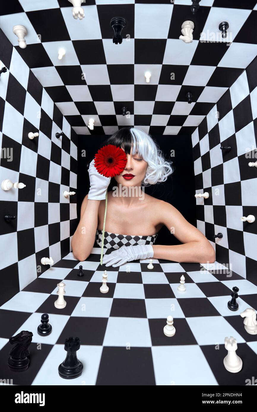 Beautiful woman with chess portrait Stock Photo - Alamy