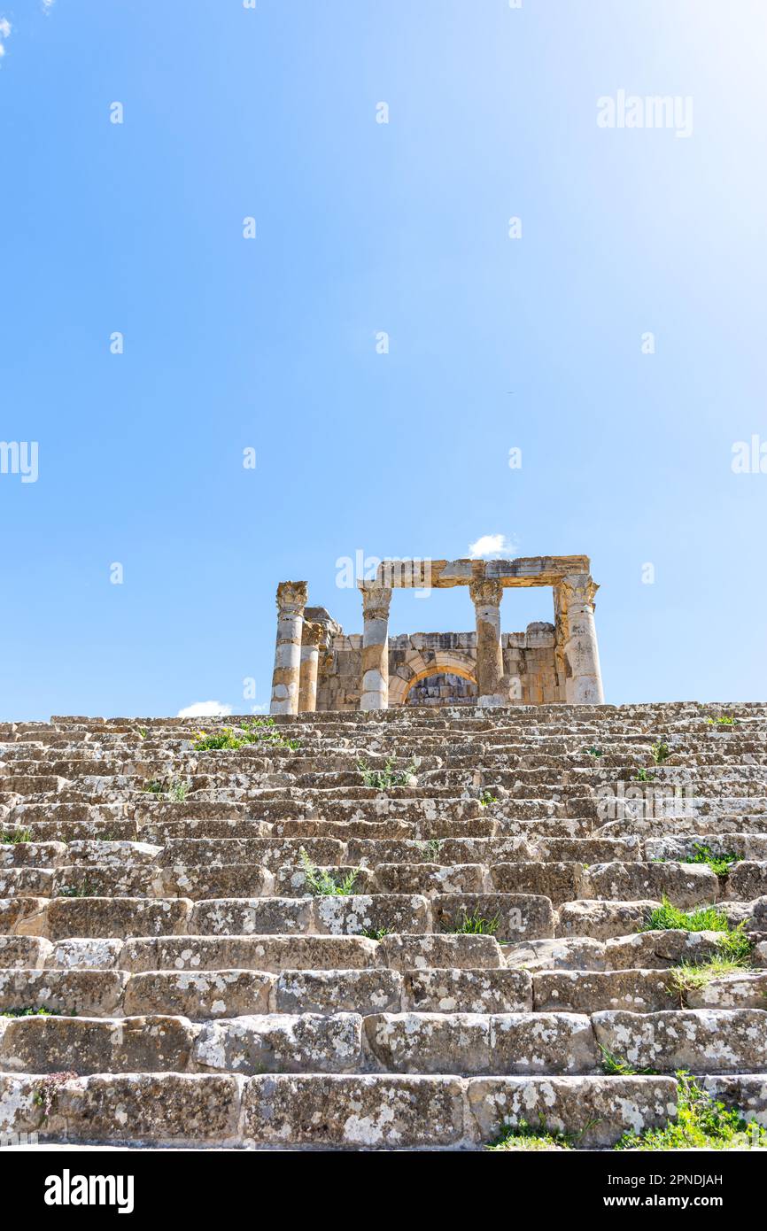 Low-angle view of (Temple of Gens Septimia) against a blue sky in the ...
