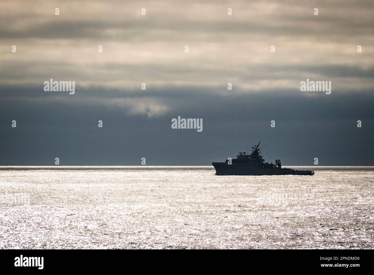 French Navy ship FS Rhone, an oceanic patrol ship and auxiliary, at sea ...