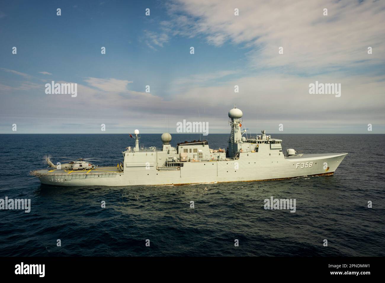 Royal Danish Navy MH-60R Seahawk helicopter flying from patrol ship ...