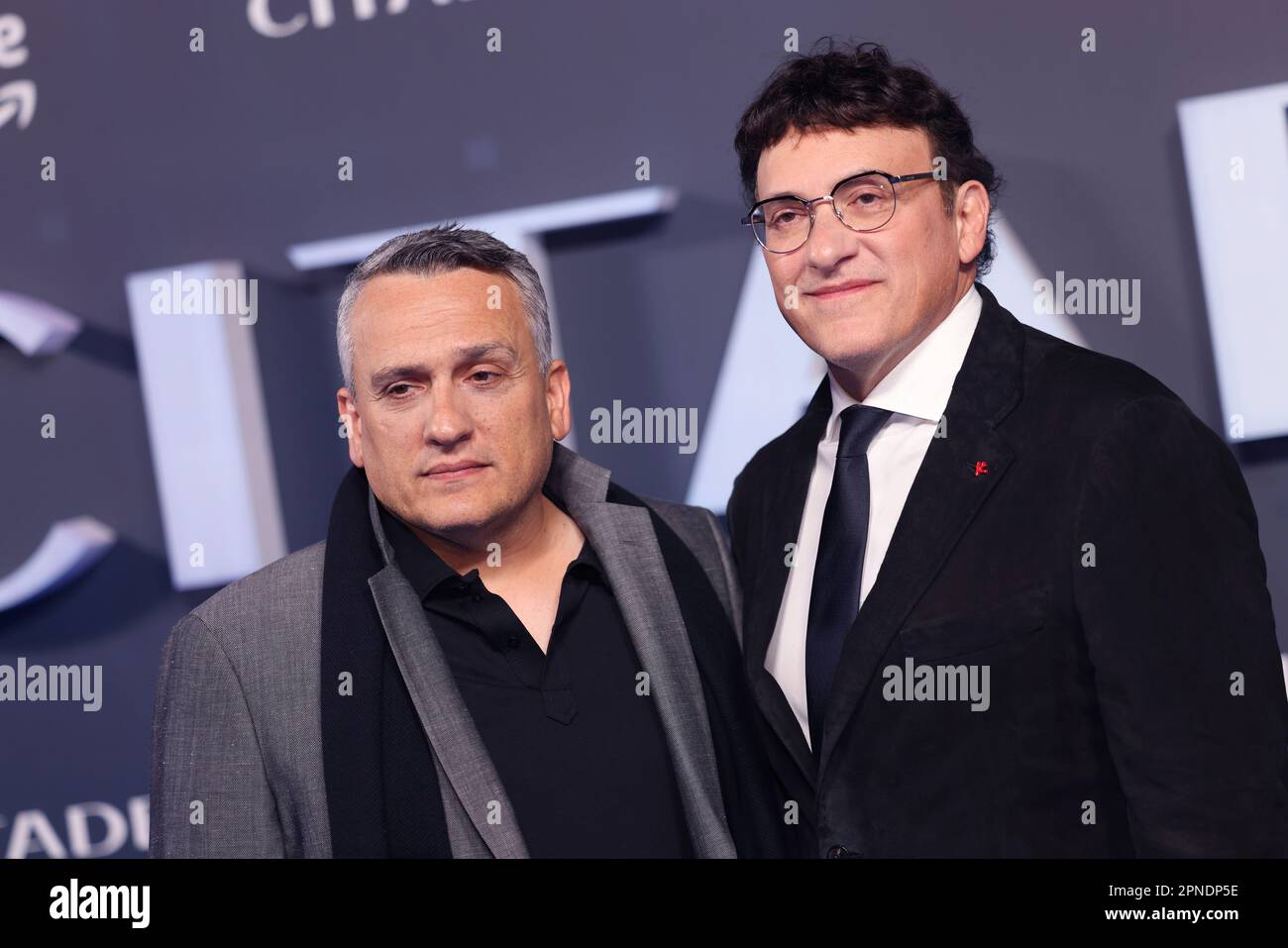 Joseph Russo, left, and Anthony Russo pose for photographers upon ...