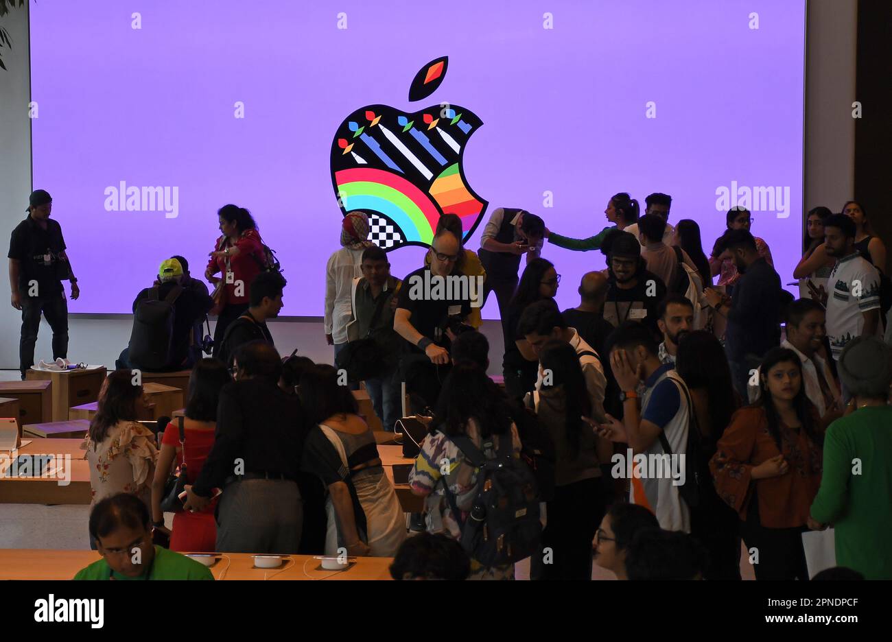 Mumbai, India. 18th Apr, 2023. People are seen inside the Apple store ...