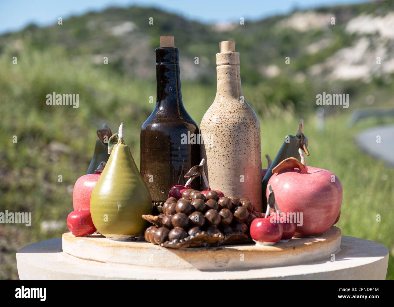 Welcome sign and still life showing village produce located on the ...