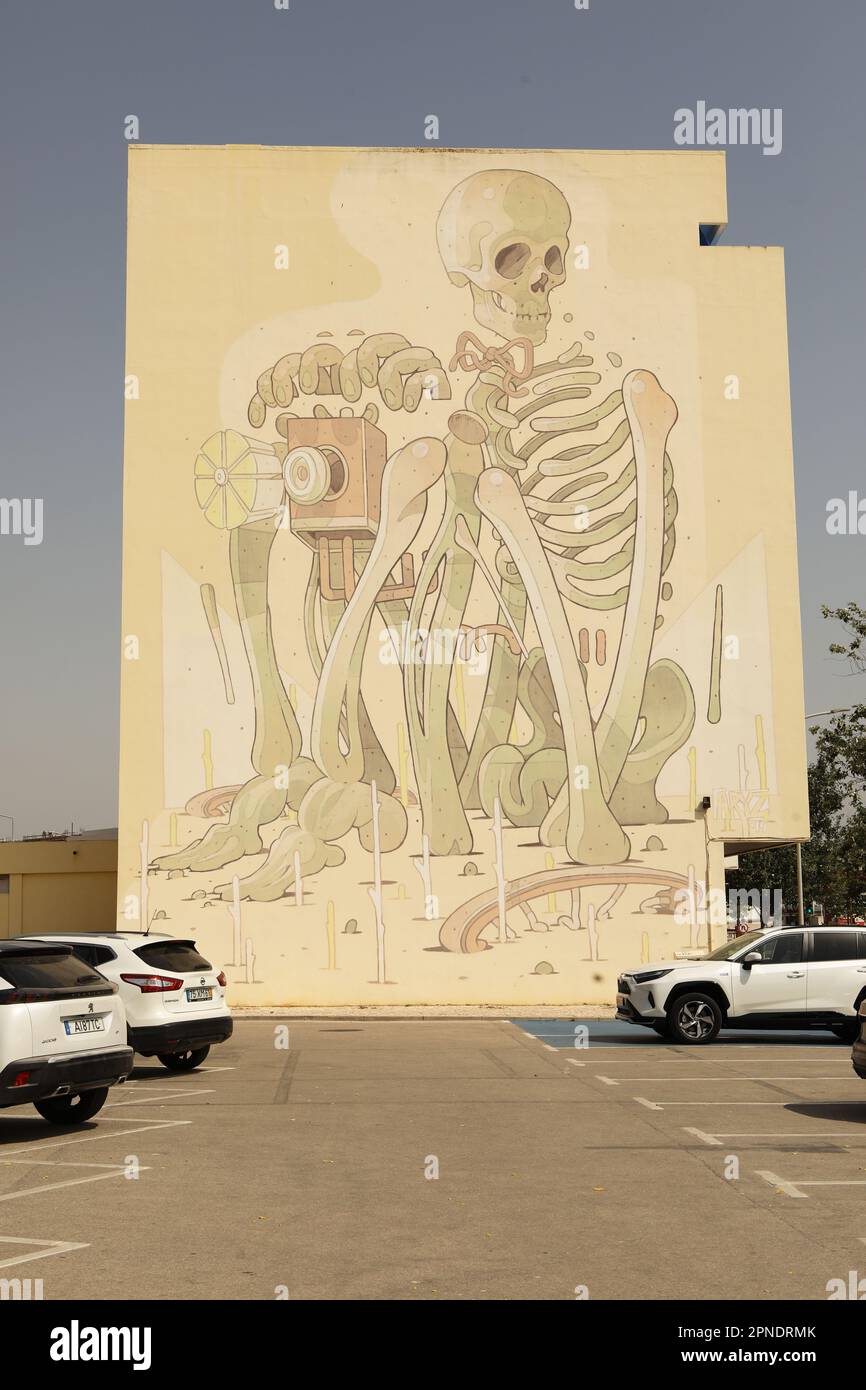 Skeleton mural on the side of an apartment block, Old Town, Lagos ...