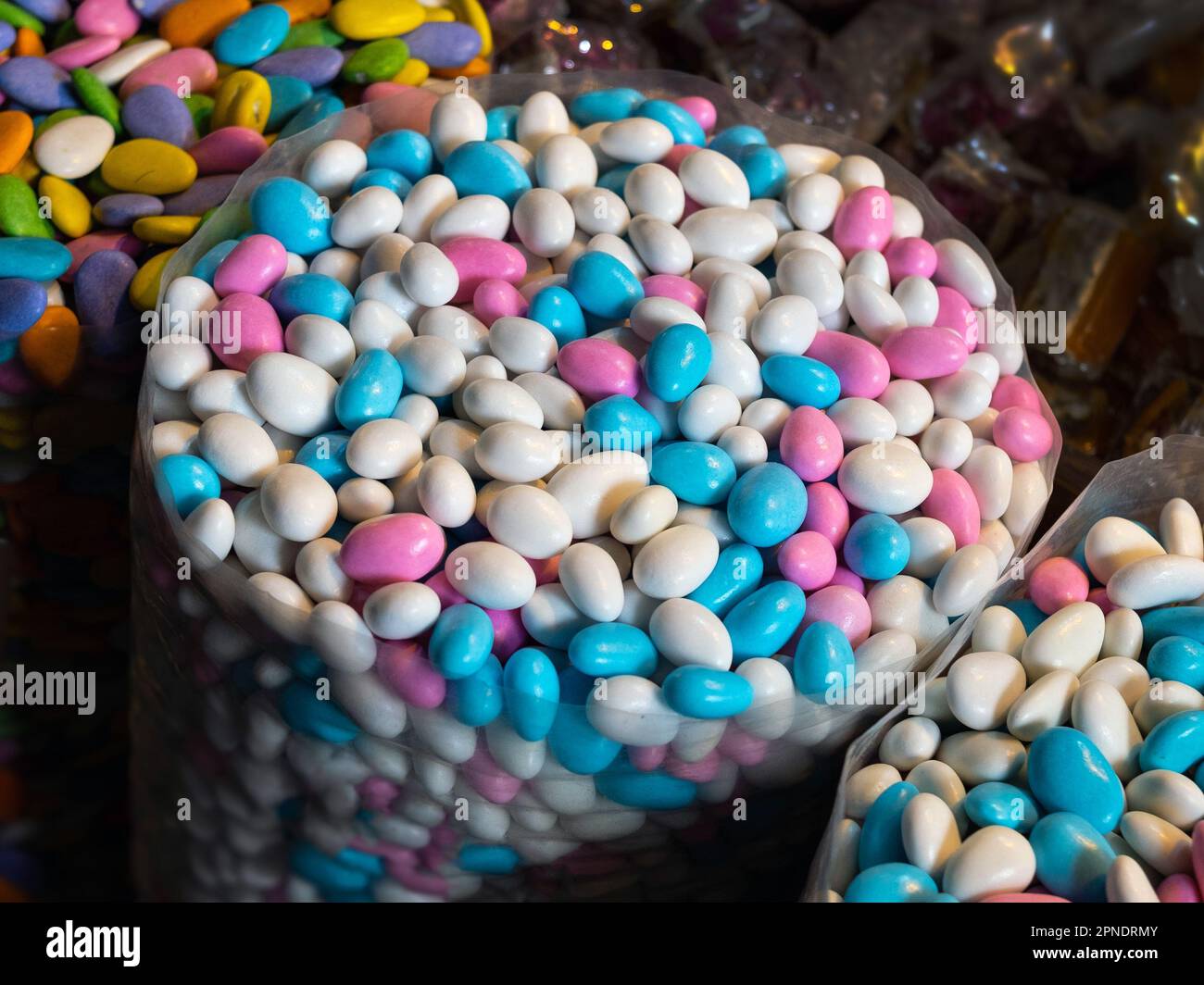 Bags of sweets, pile of coated almonds Stock Photo - Alamy