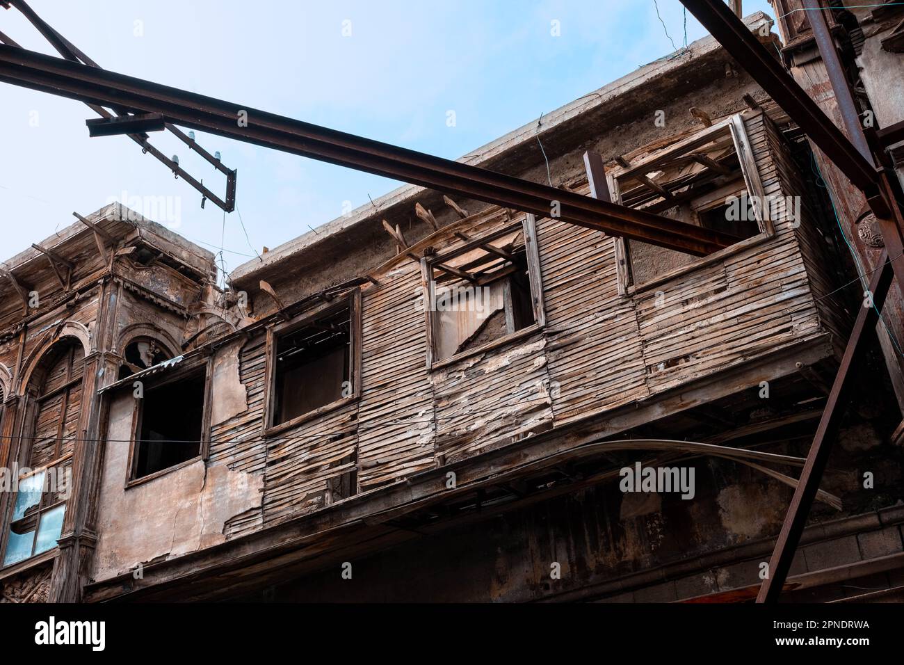 Historic wooden facade of a building ruin in old town of Damascus ...