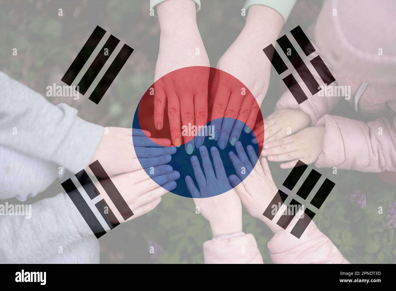 Hands of kids on background of South Korea flag. South Korean ...