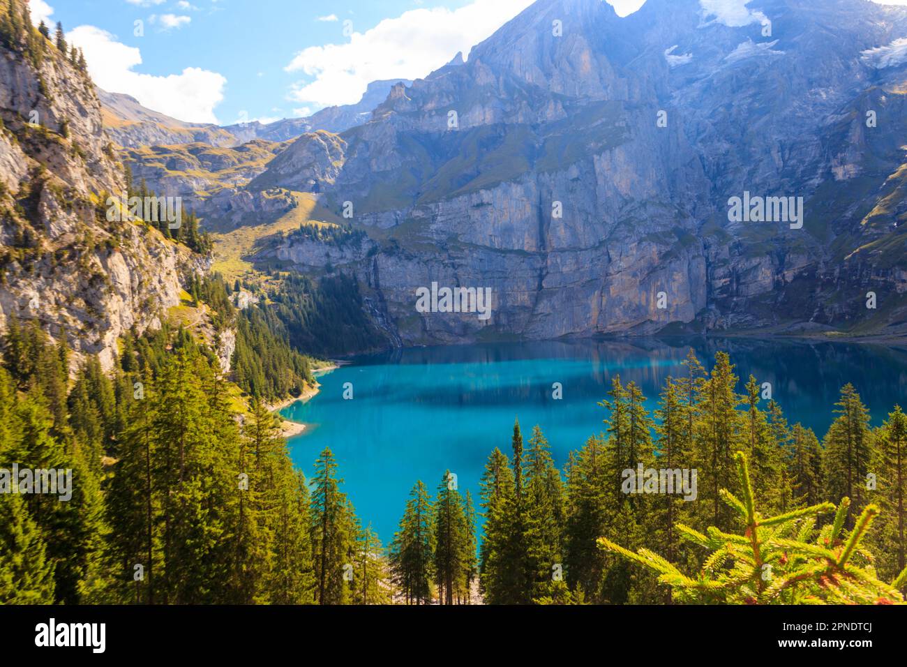 View of Oeschinen lake (Oeschinensee) and Swiss Alps near Kandersteg in ...
