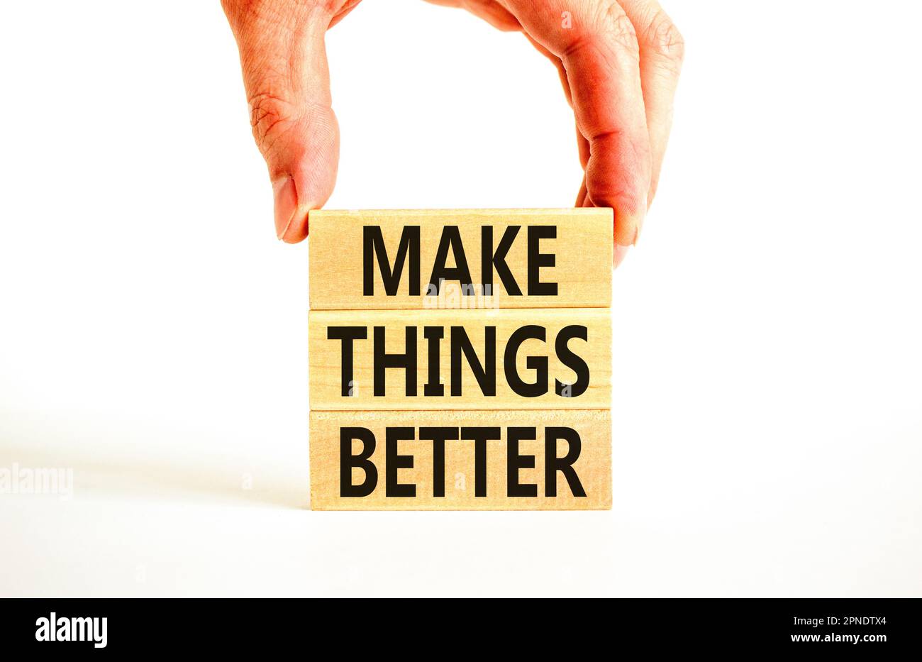 Make things better symbol. Concept words Make things better on wooden ...