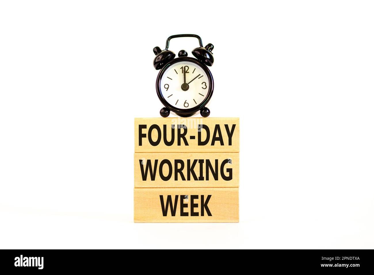 Four-day working week symbol. Concept words Four-day working week on wooden block on a beautiful ...
