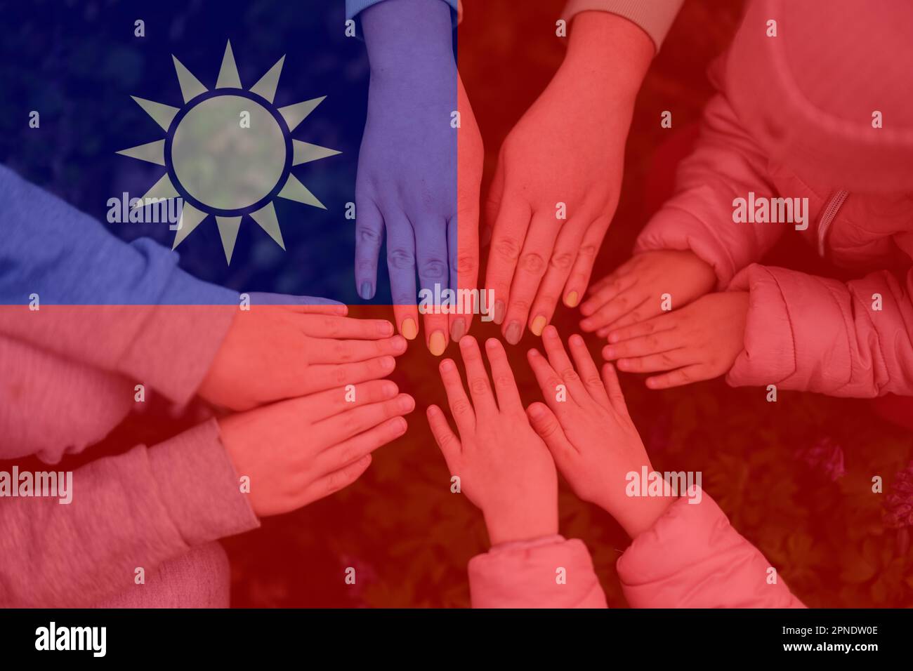 Hands of kids on background of Taiwan flag. Taiwanese patriotism and ...
