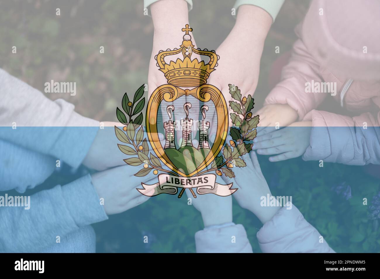 Hands of kids on background of San Marino flag. Sammarinese patriotism ...