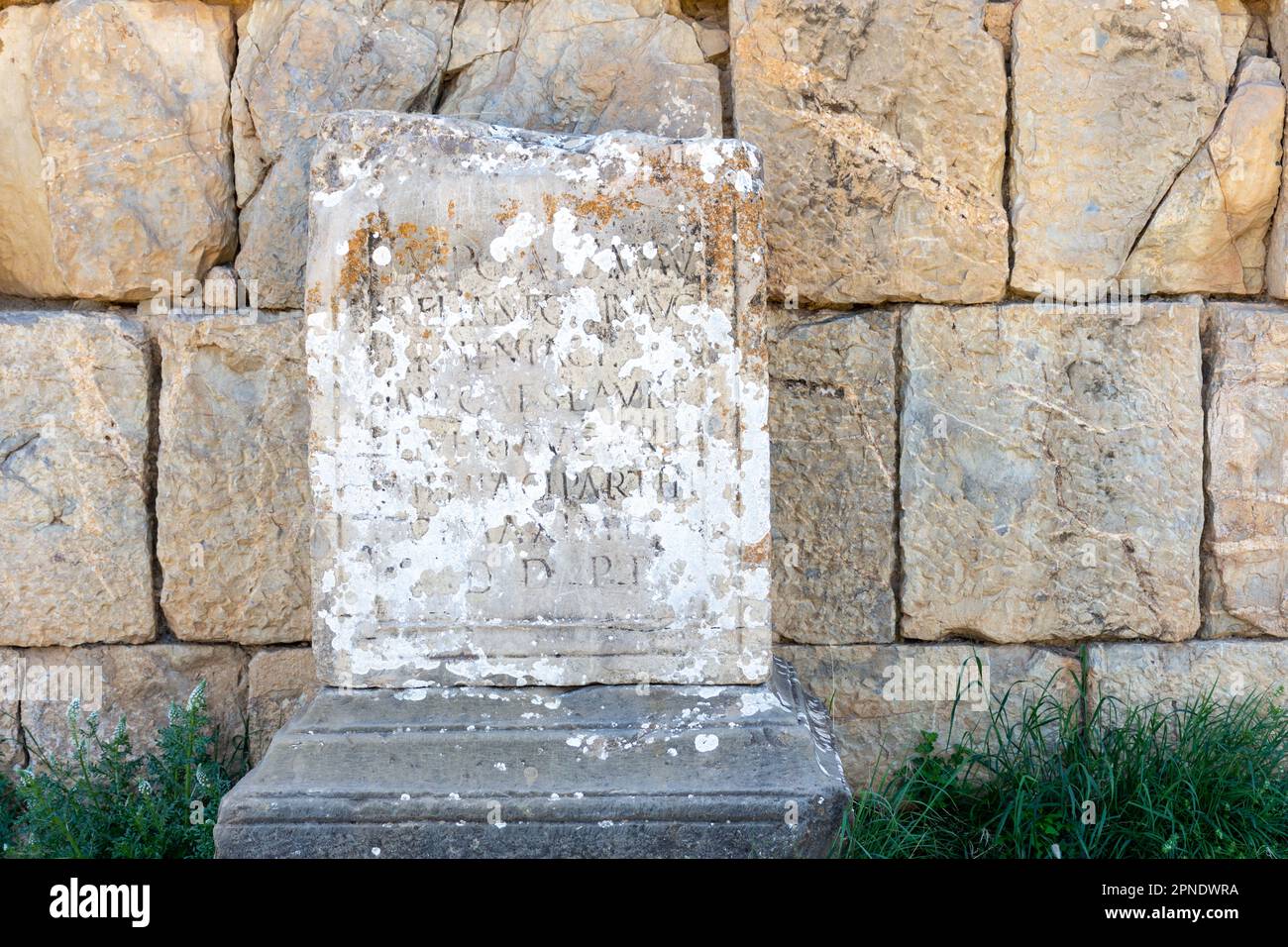 Stone with an inscription in Latin script in the ancient city of Cuicul ...