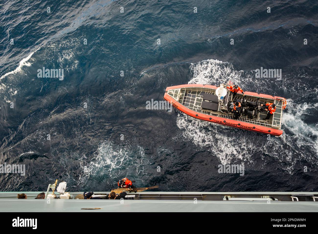 Personnel undertaking a boarding exercise of HMCS Margaret Brooke ...