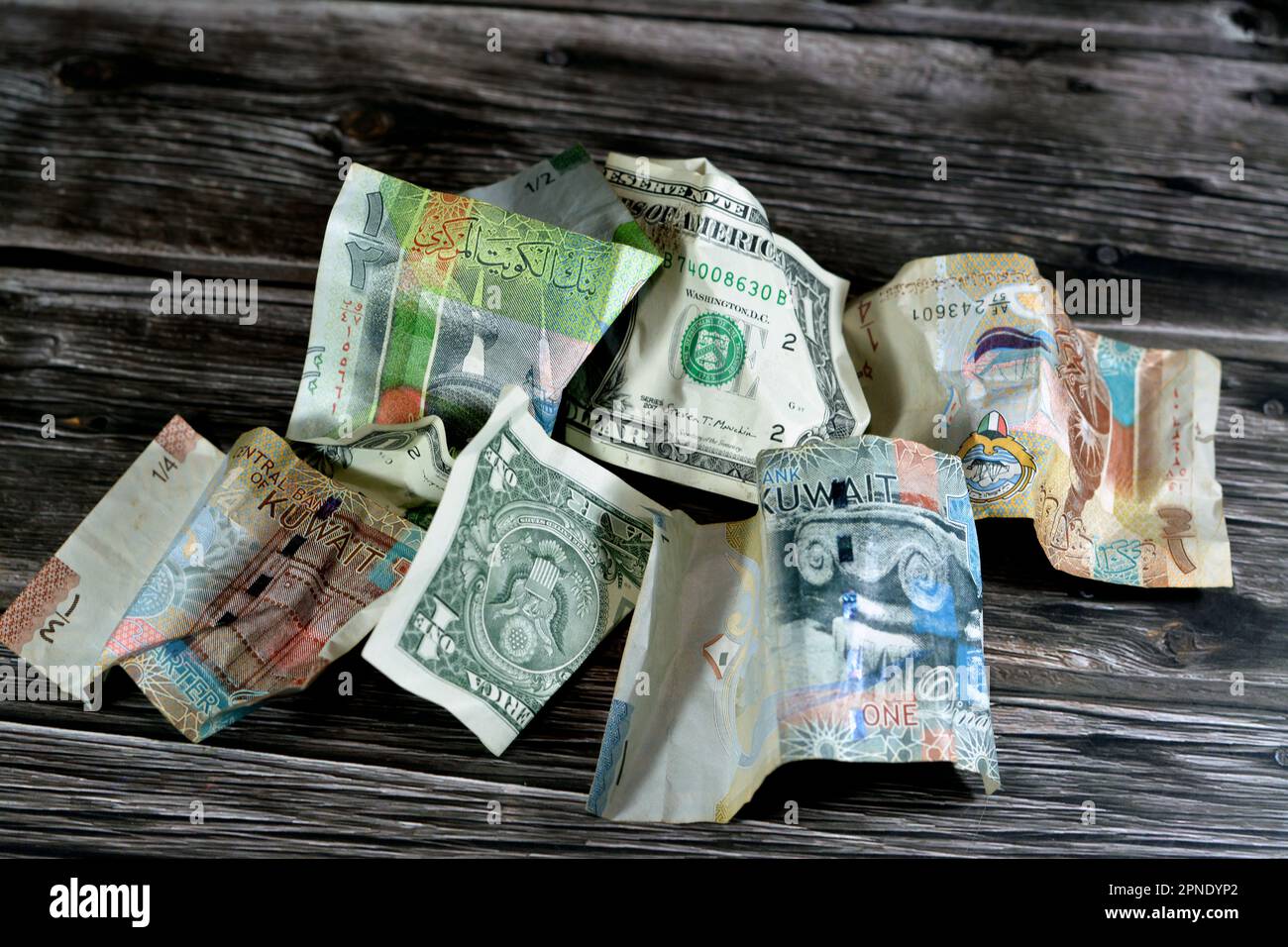 Wrinkled and crumpled Kuwaiti half, quarter and one KWD dinar bills ...