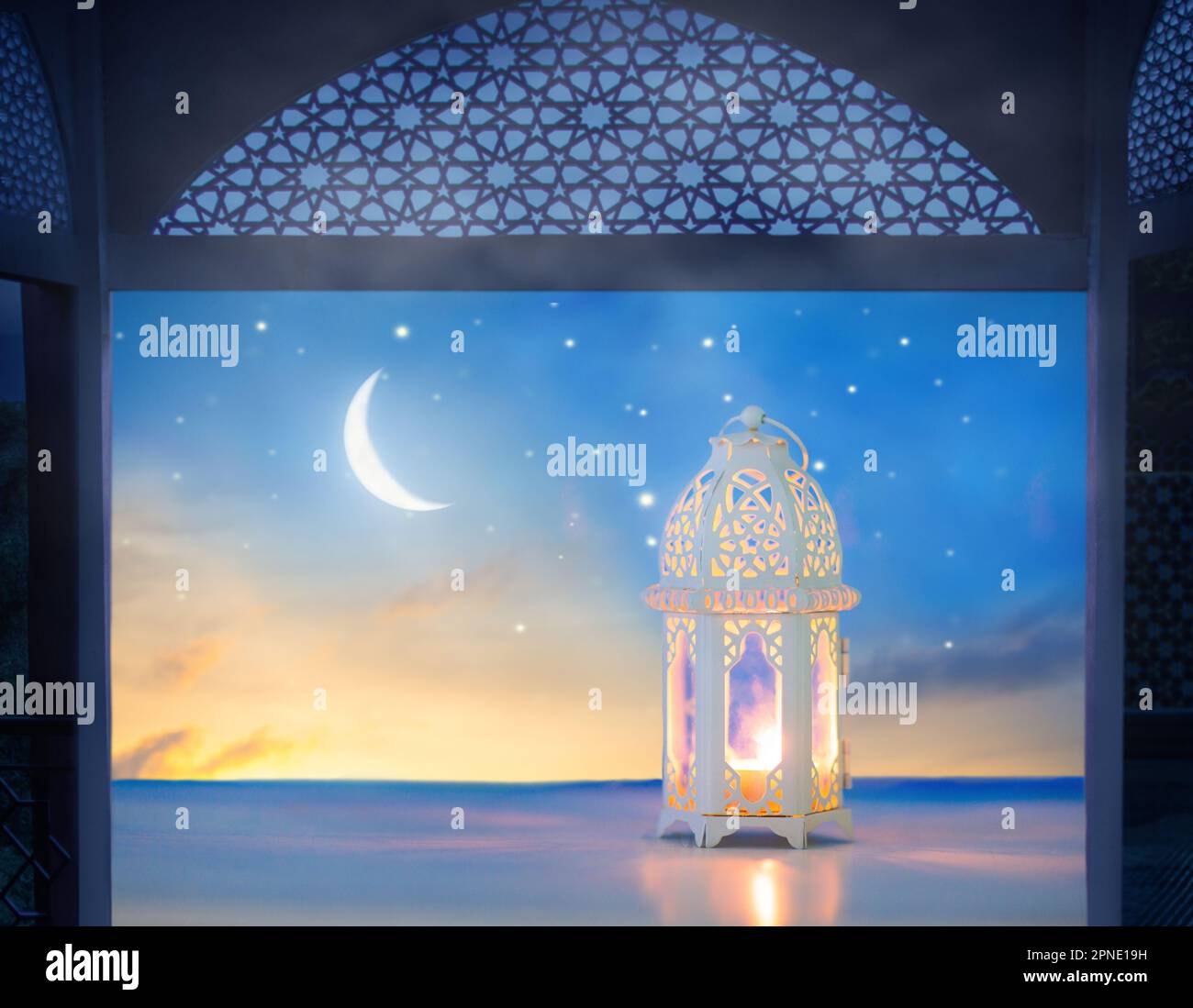 Ramadan Kareem greeting. Islamic lantern on night sky with crescent moon and stars. End of ...