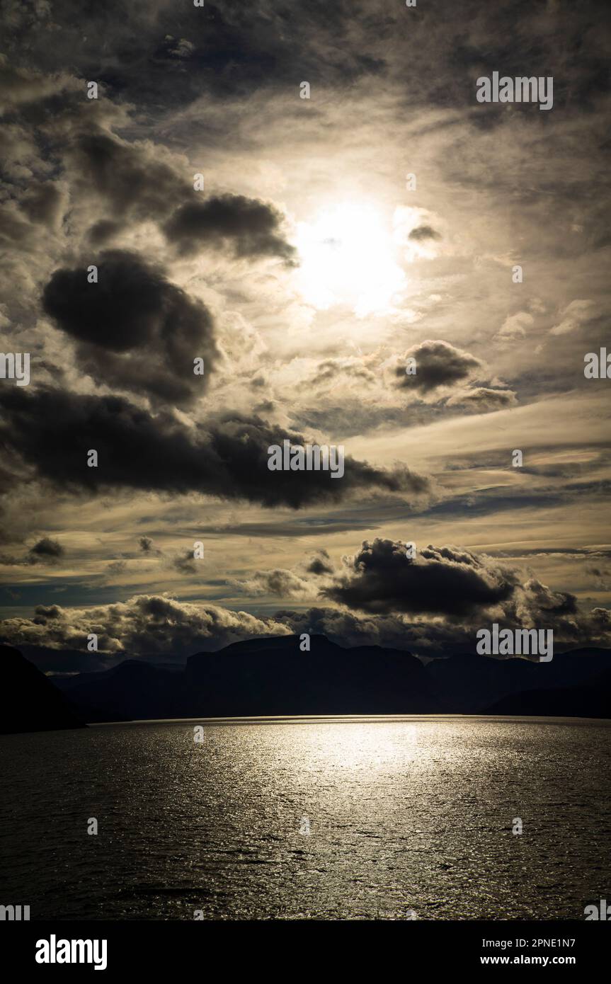 Saglek Fjord in silhouette of the late day sun in northern Labrador ...