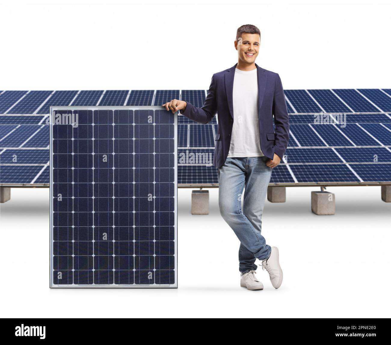 Casual man leaning on a solar panel and smiling isolated on white ...
