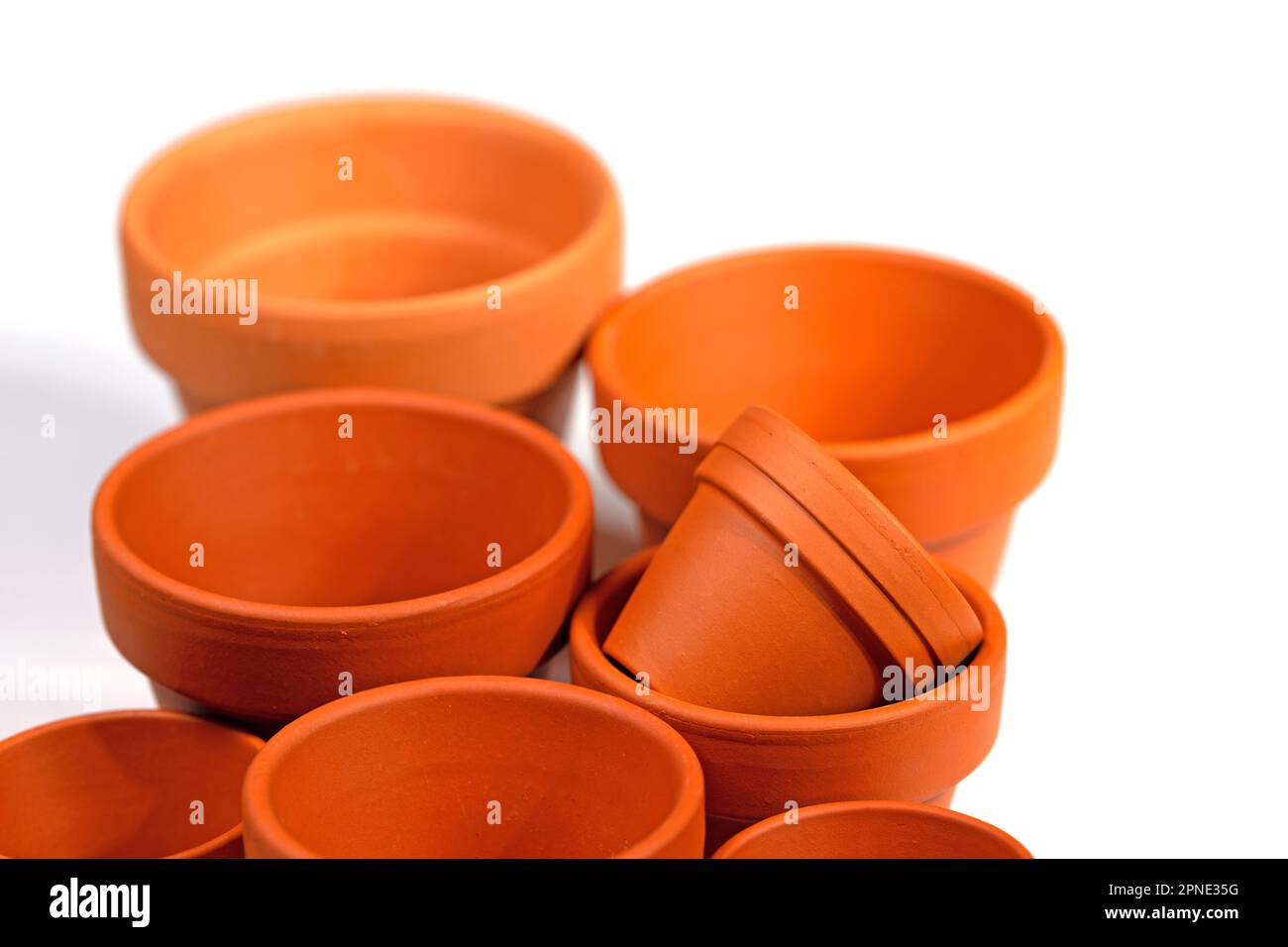 Empty flower pots isolated against white background Stock Photo - Alamy