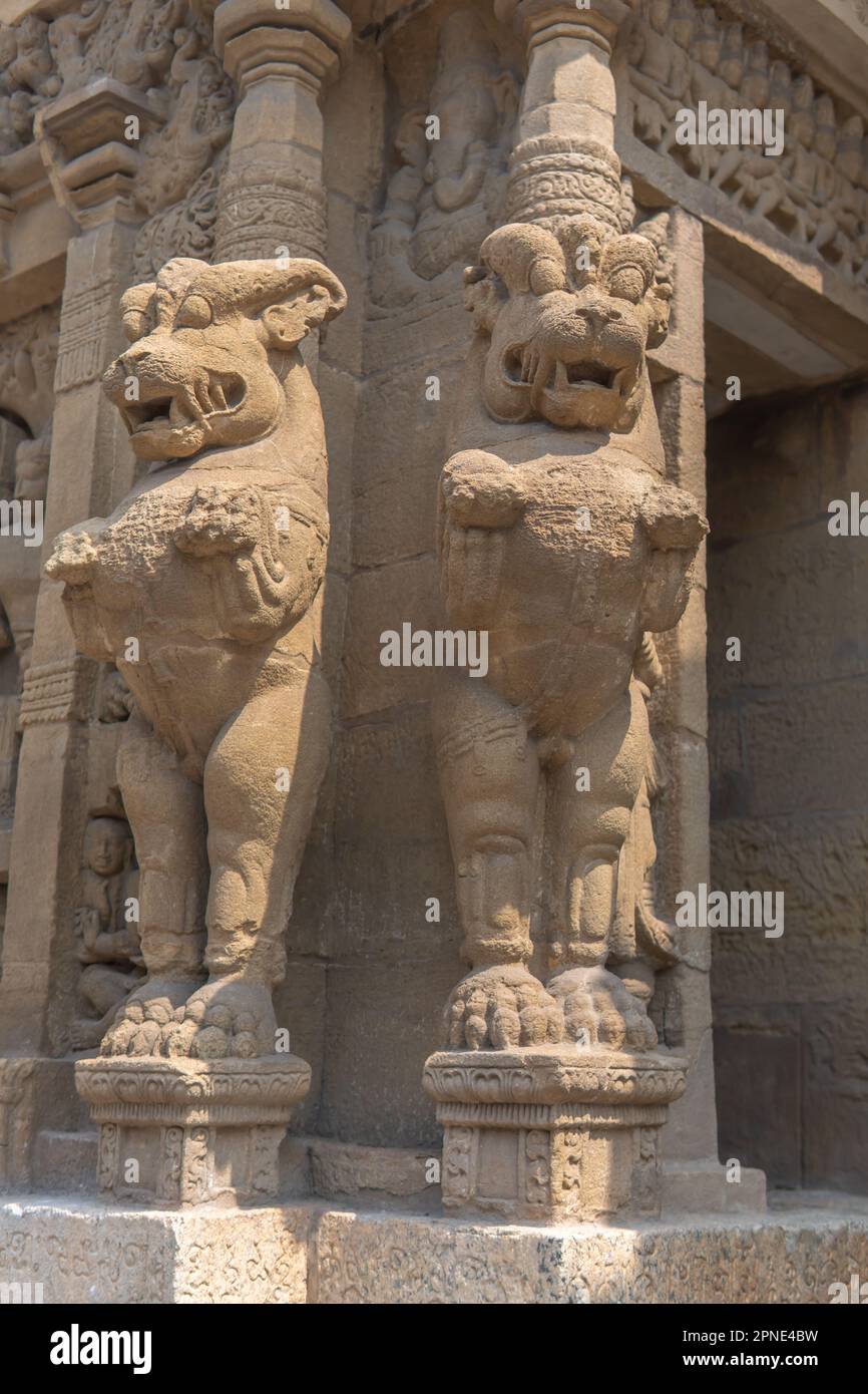 Old sculpture of two mythological lions on the wall corner at ...