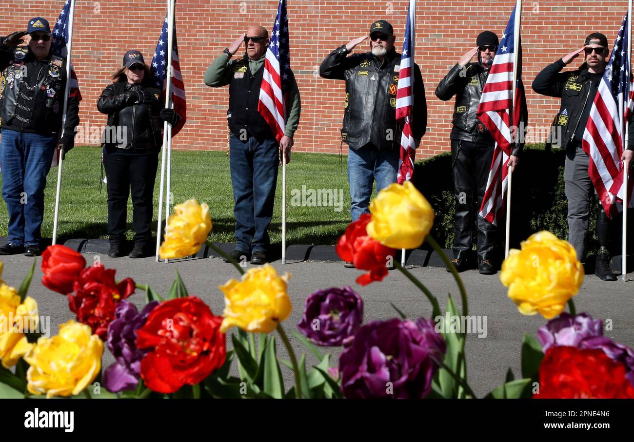 Patriot Guard Riders salute the Honor Ride Humvee carrying the casket U ...
