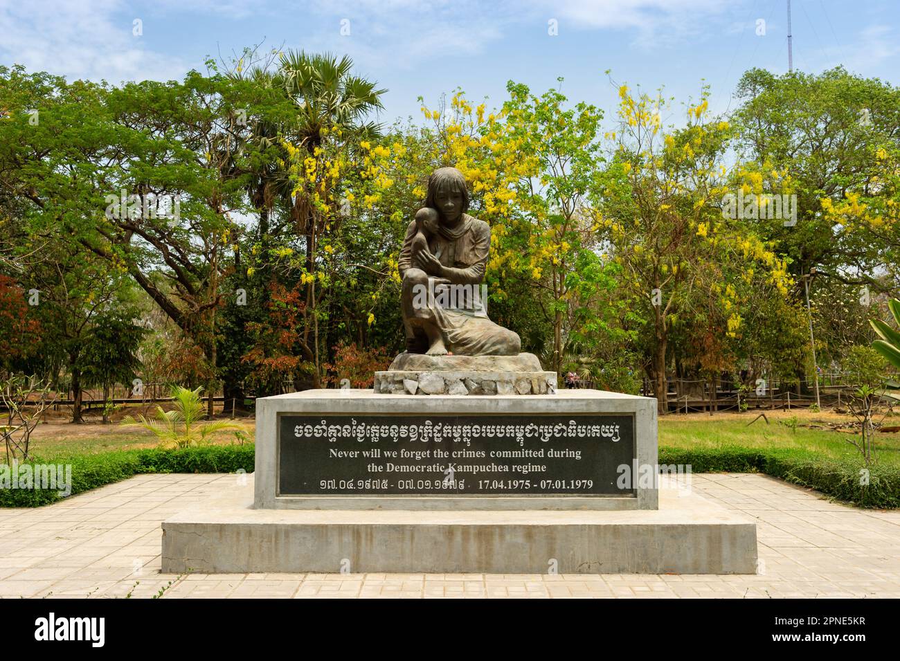 Memorial statue of a mother and her child at the Cheung Ek Genocidal ...