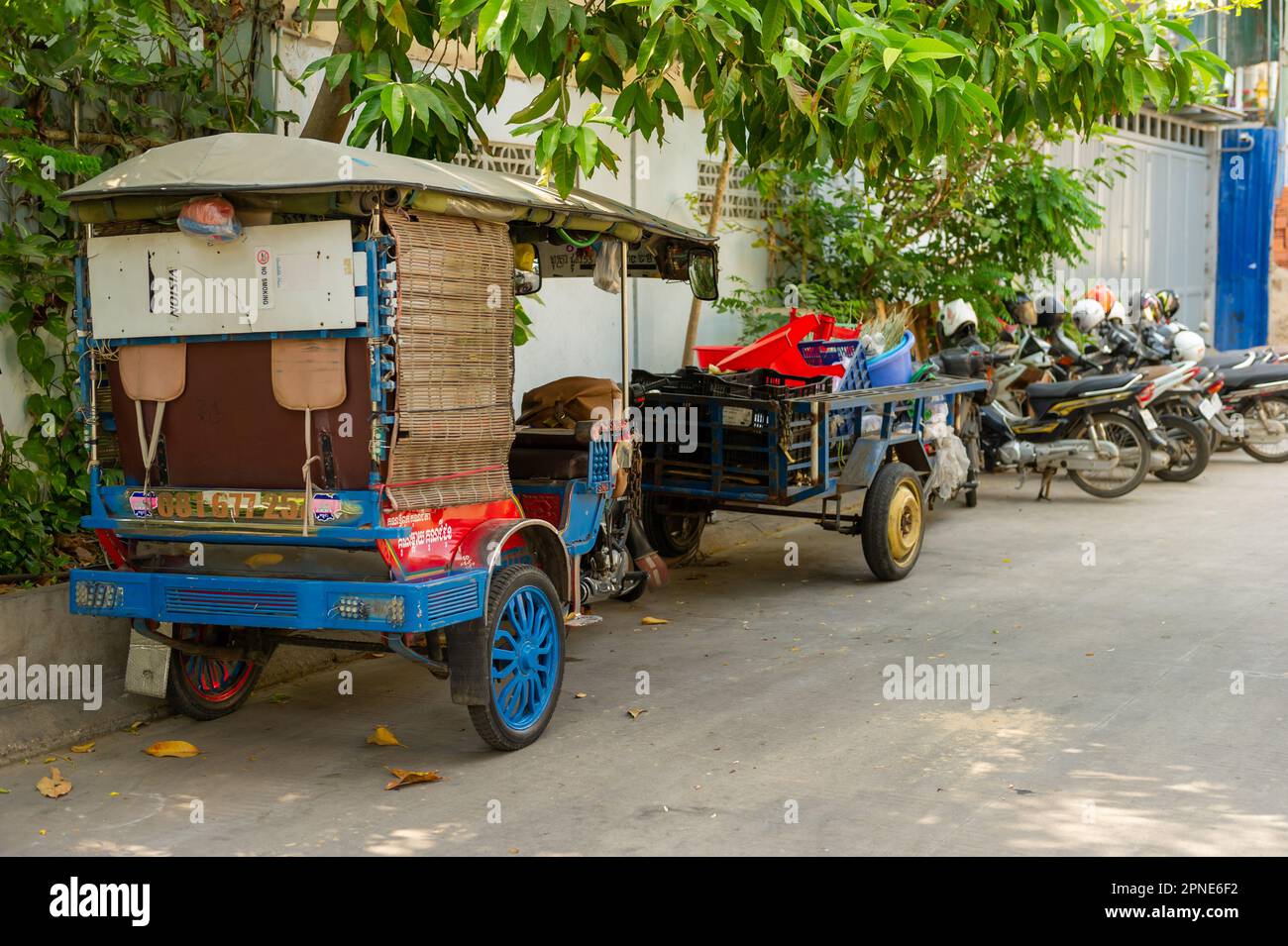 A parked up 3 wheeled rickshaw in Phnom Penh, Cambodia Stock Photo - Alamy