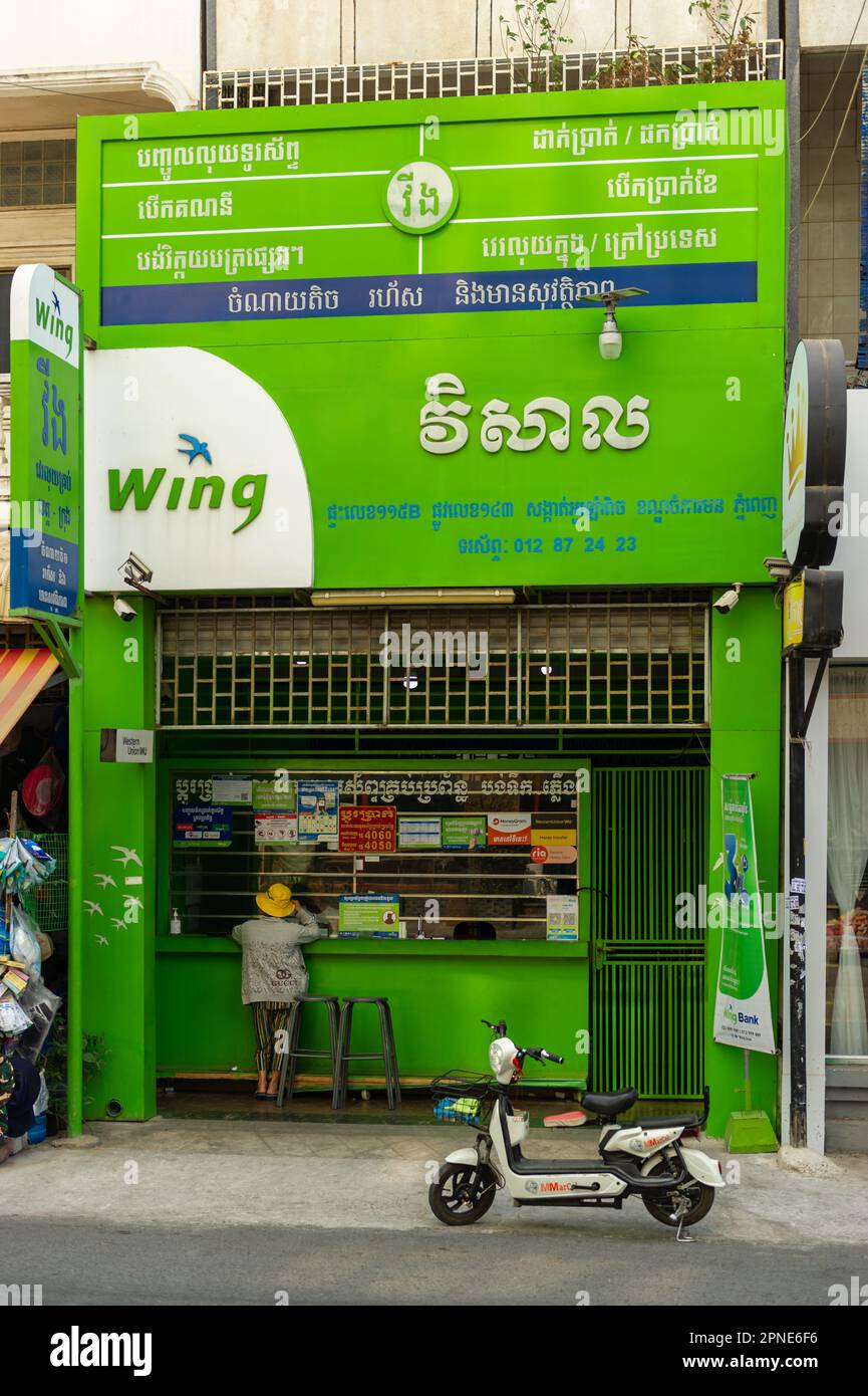 A customer transferring money in Phnom Penh, Cambodia Stock Photo - Alamy
