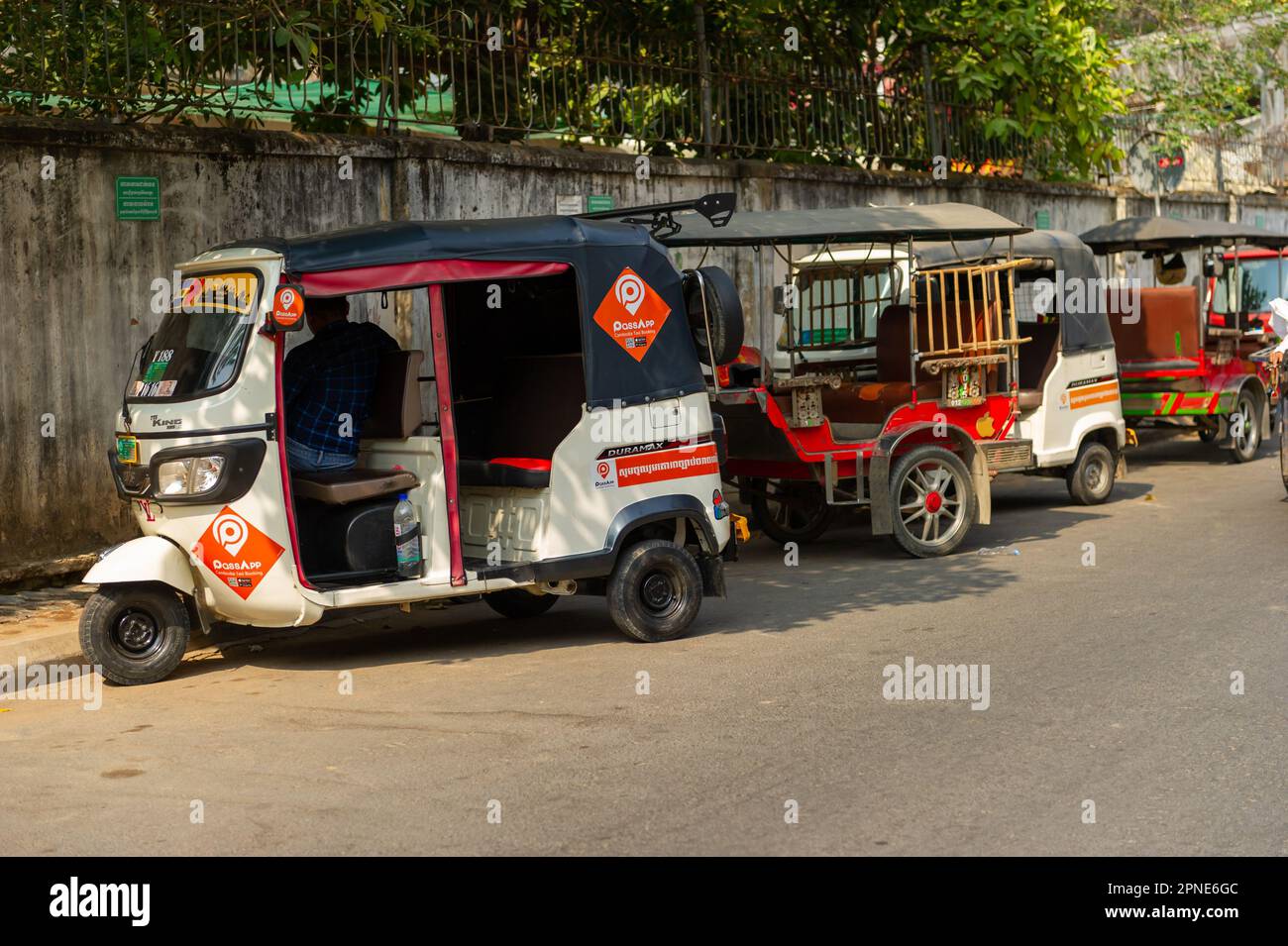 Phnom Penh Tuc Tuc drivers waiting for business Stock Photo - Alamy