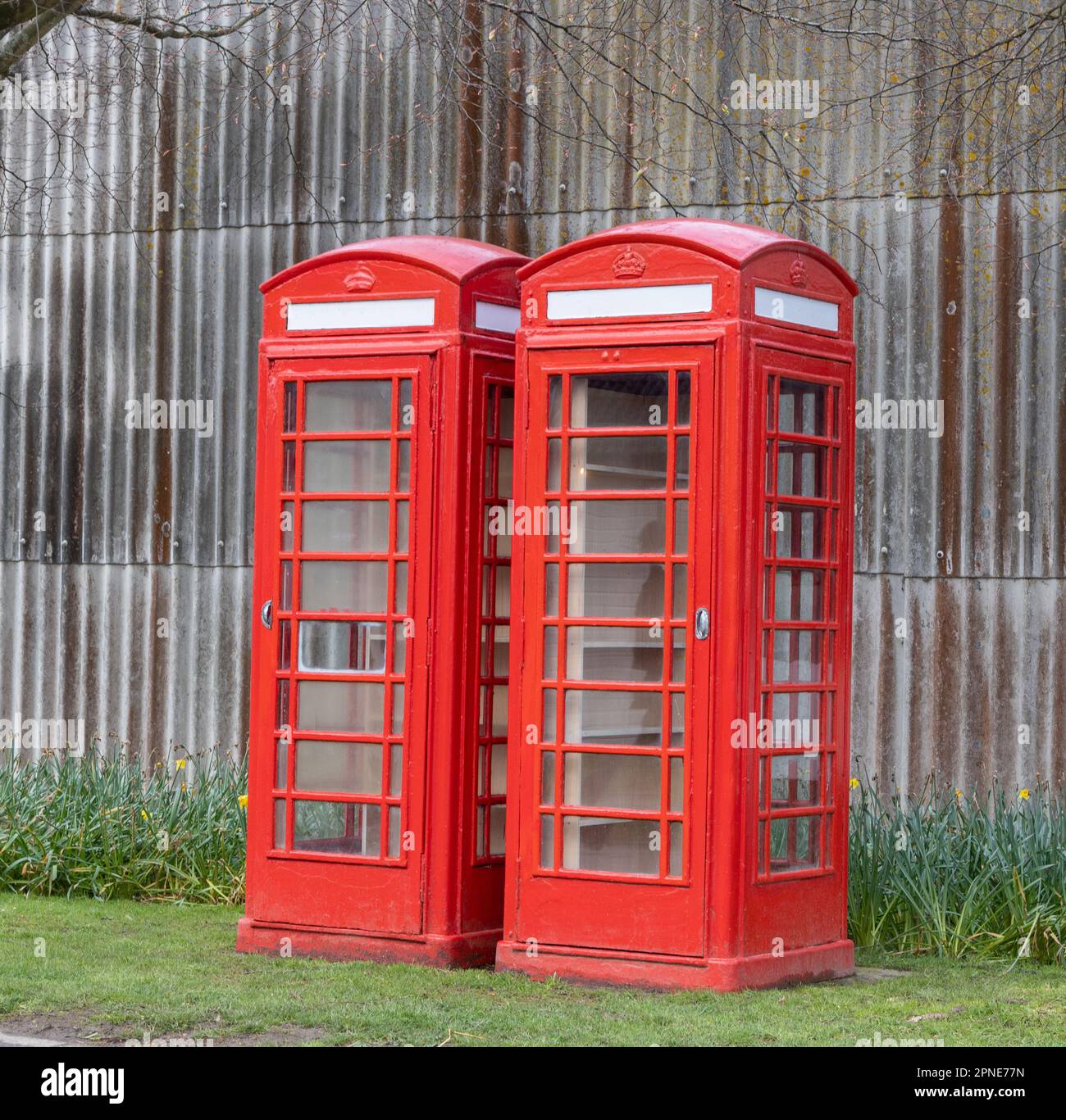 April 2023 - Red classic British Telephone boxes at the 80th Goodwood ...