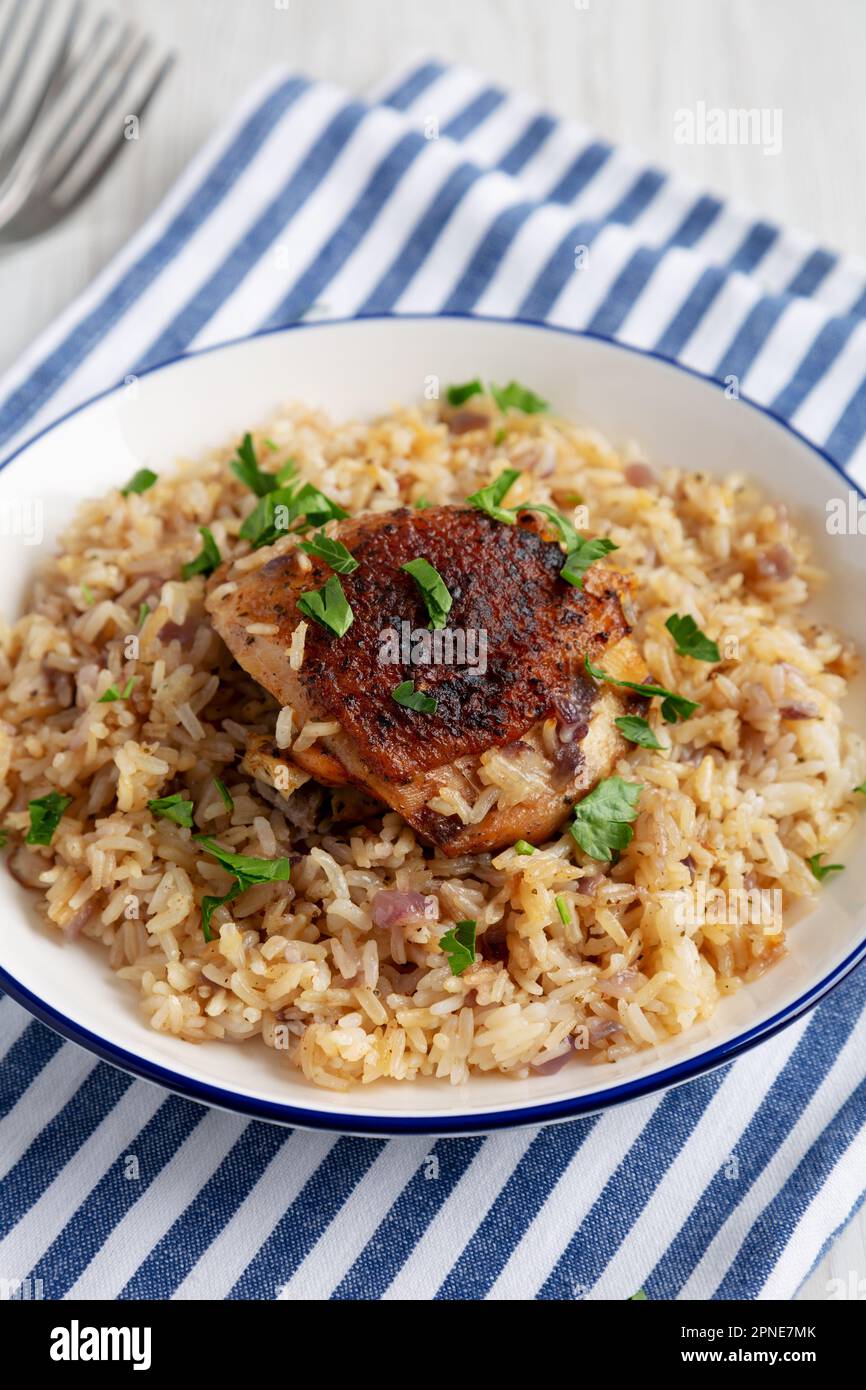 Homemade Paprika Chicken and Rice on a Plate, side view Stock Photo - Alamy