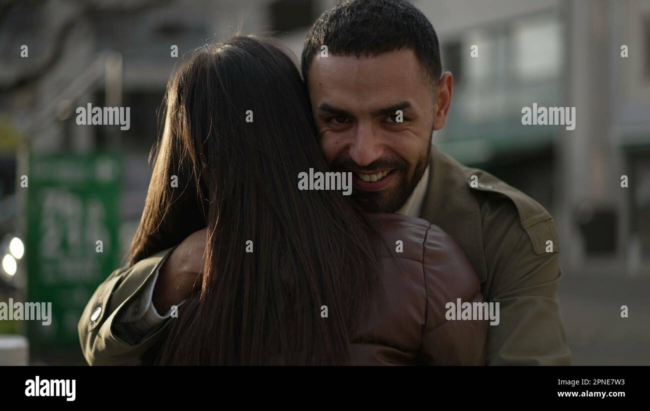 Affectionate Hug in Urban Setting Genuine Friendship and Care between ...