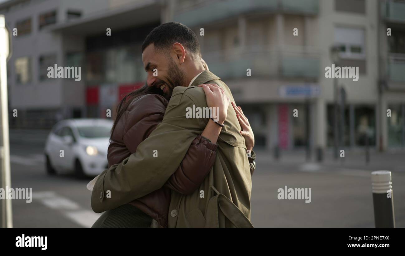 Affectionate Hug in Urban Setting Genuine Friendship and Care between ...