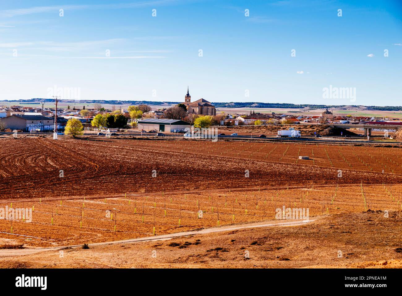 Landscape of the town of Tembleque surrounded by farm fields and the A4 ...