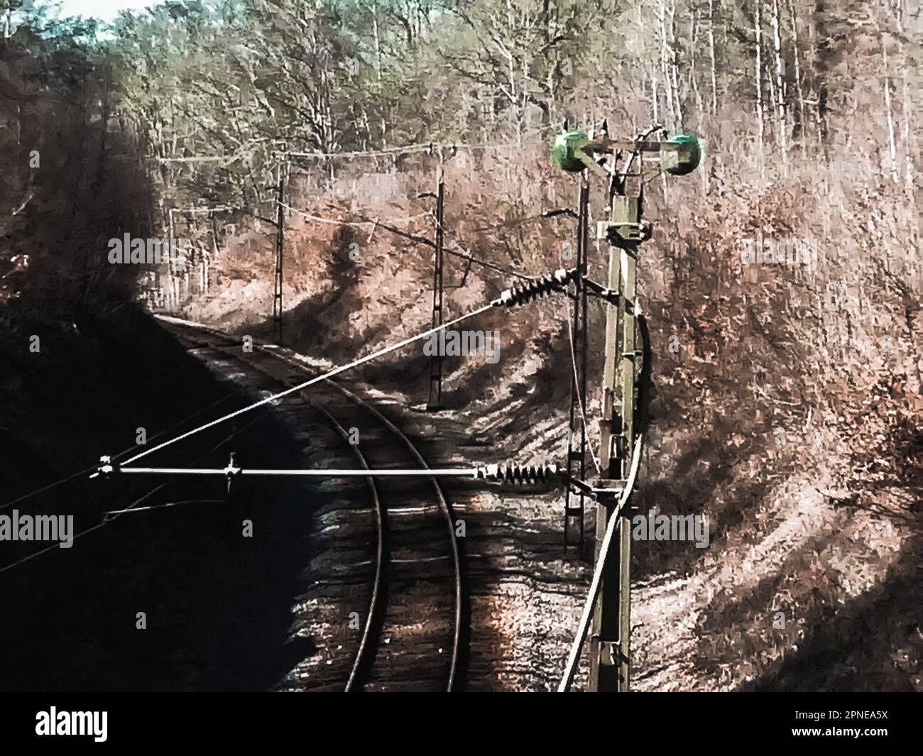 Aerial view of a curved railway track snaking through a scenic countryside environment Stock ...