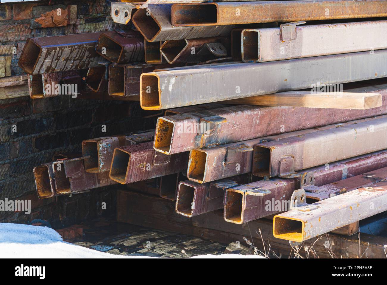 Iron rectangular pipes. Construction fittings. Metal materials for construction Stock Photo - Alamy