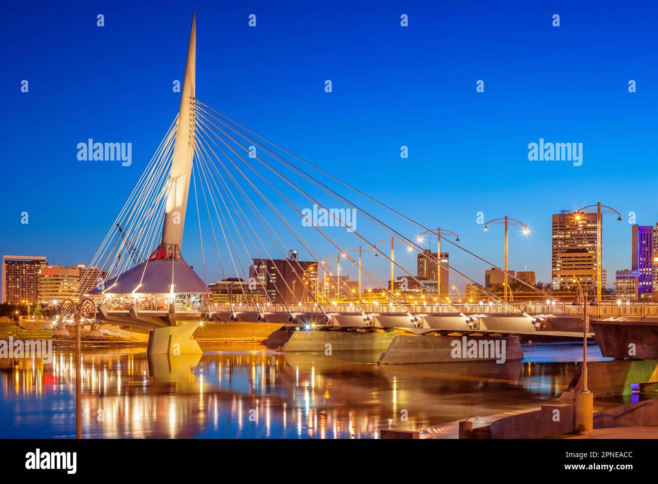 Skyline of downtown Winnipeg with the Provencher Bridge and the Red ...
