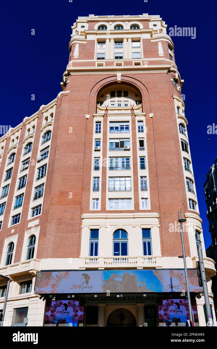The Palacio de la Prensa is a brick-clad building in Madrid. It is ...