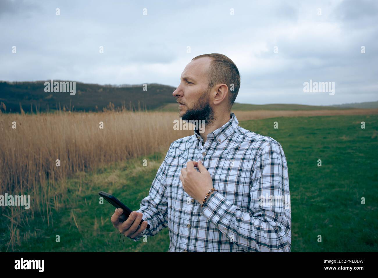 Portrait photo of a man in the countryside Stock Photo - Alamy