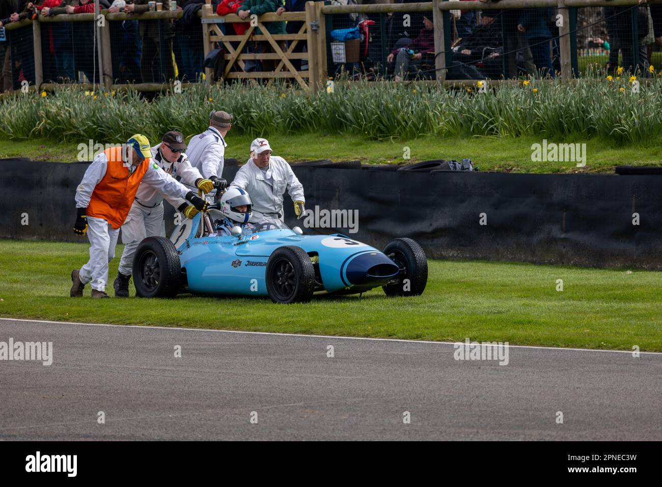 April 2023 - Track marshals pushing a car after the end of the race ...