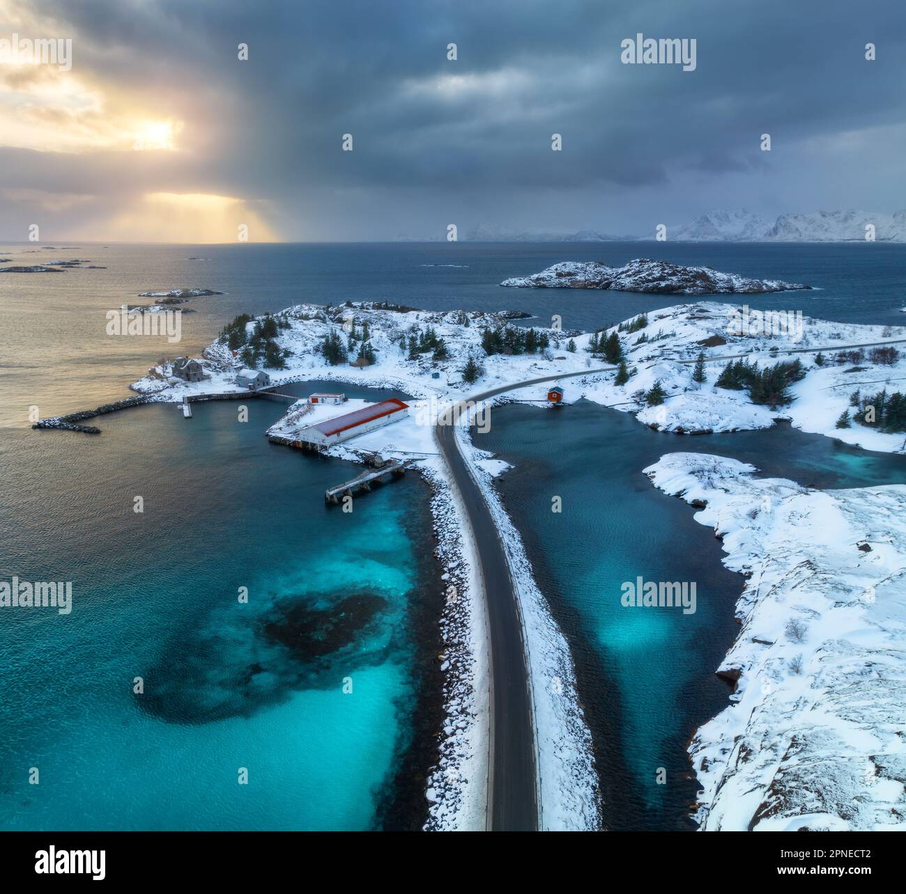 Aerial view of road, island in snow, rorbu, sea, bridge Stock Photo - Alamy