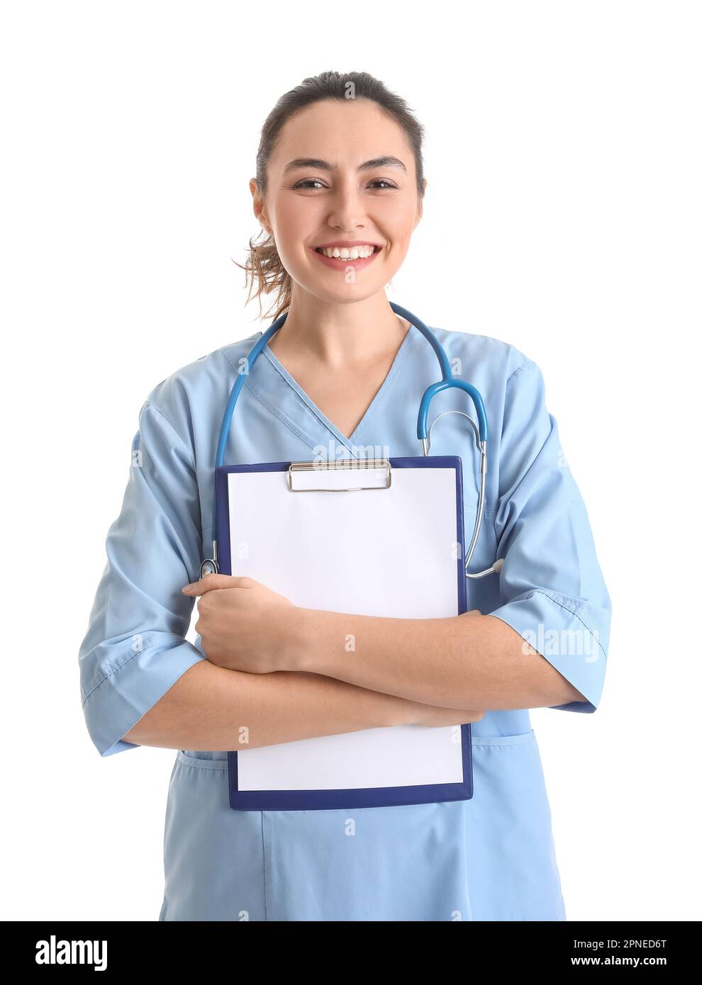 Female medical assistant with clipboard on white background Stock Photo ...