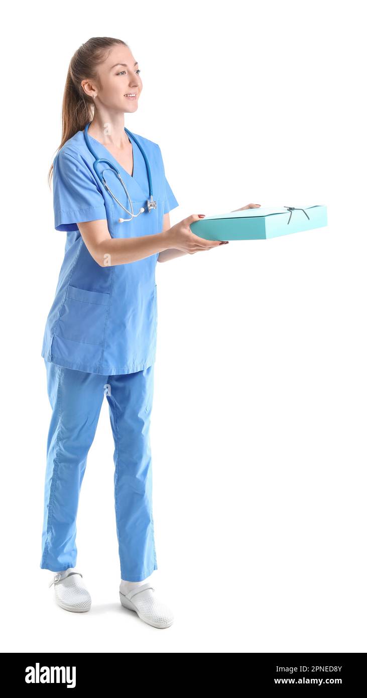 Female medical intern with folder on white background Stock Photo - Alamy